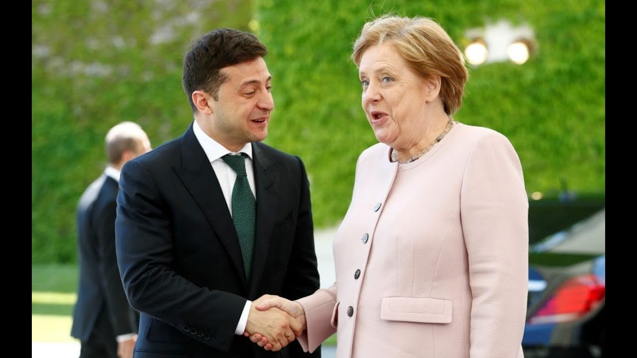 merkel-shake – CITIZEN FREE PRESS